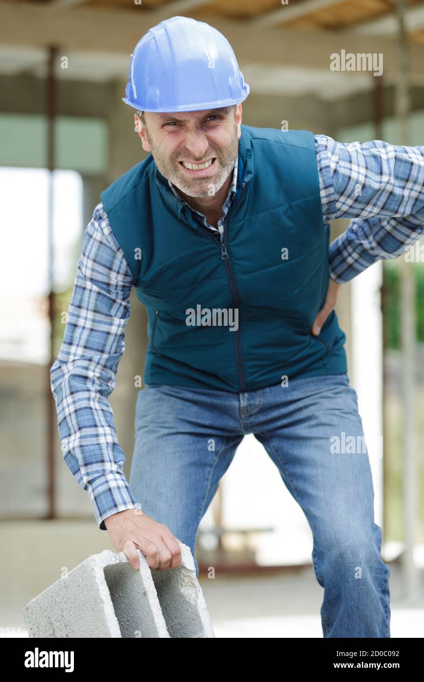 construction worker getting back injury Stock Photo - Alamy construction worker getting back injury Stock Photo - Alamy