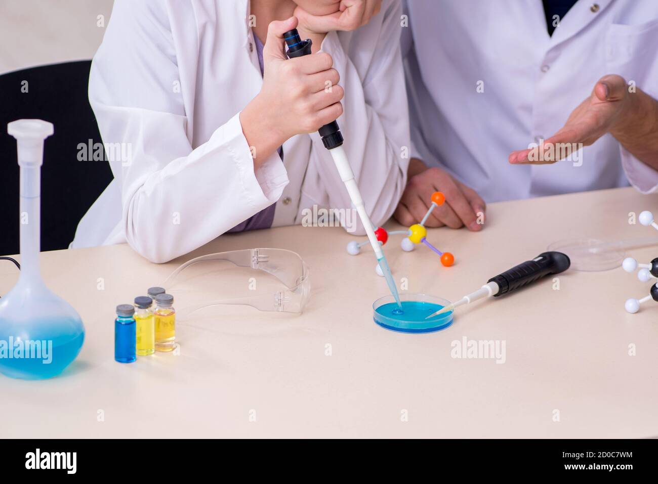Young father and son chemists in the laboratory Stock Photo - Alamy