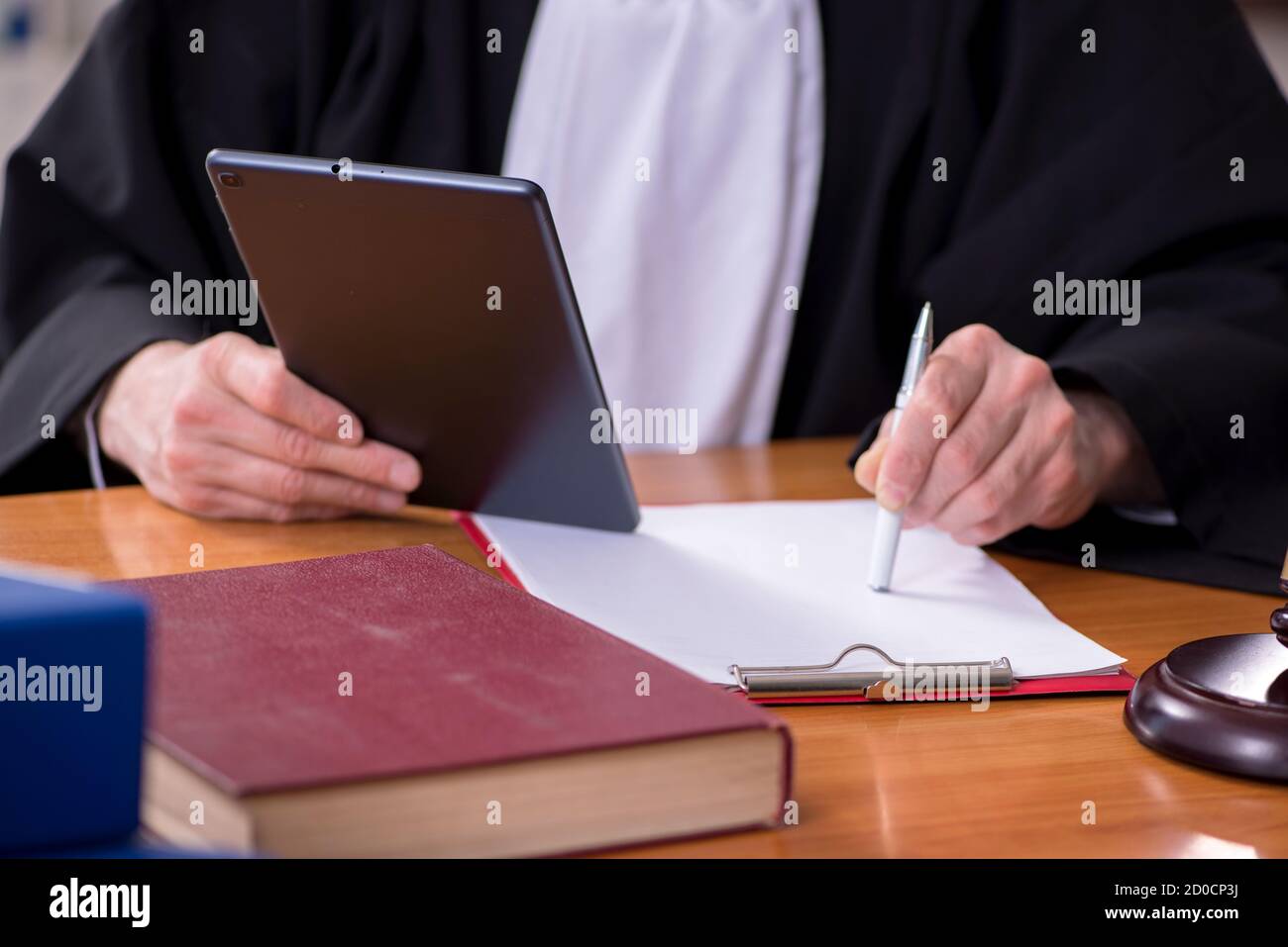 Old judge working in courthouse Stock Photo - Alamy