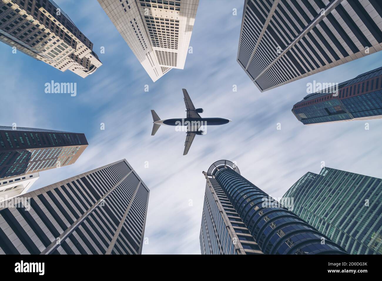 Aeroplane flying above buildings High Resolution Stock Photography and ...