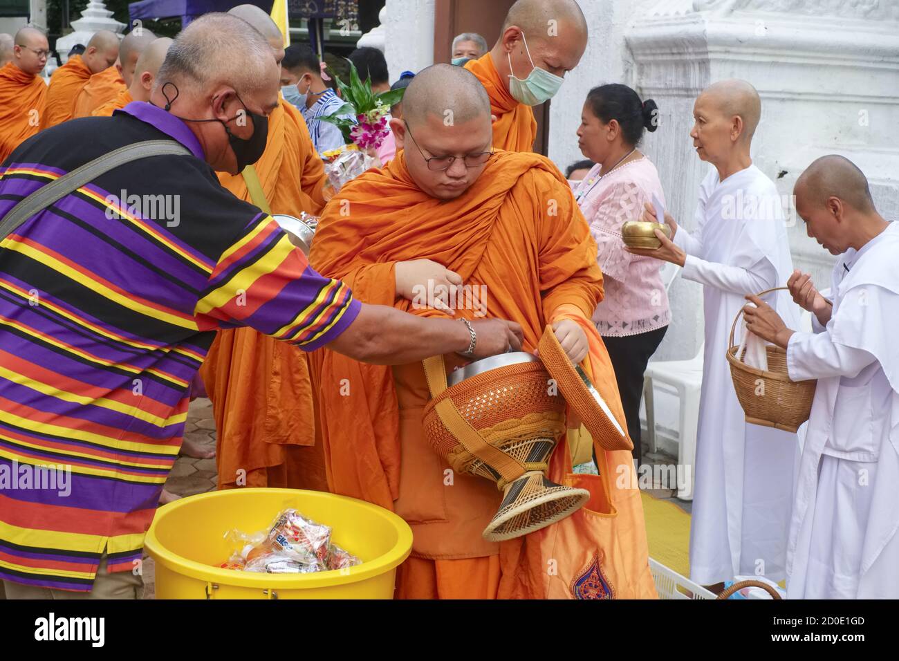 On occasion of Buddhist holiday Ok Phansa, laymen and white-dressed ...