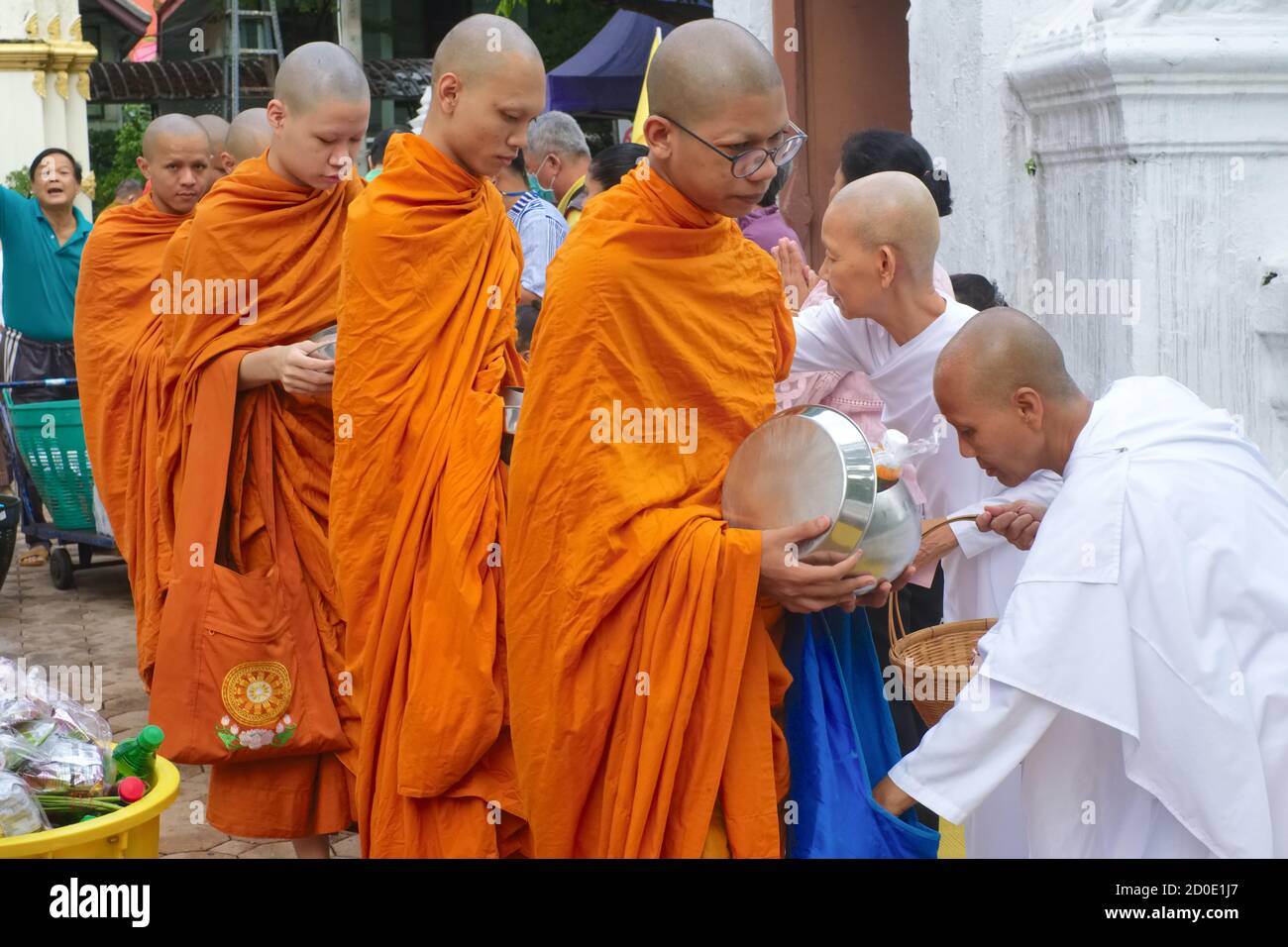 On occasion of Buddhist holiday Ok Phansa, laymen and white-dressed ...