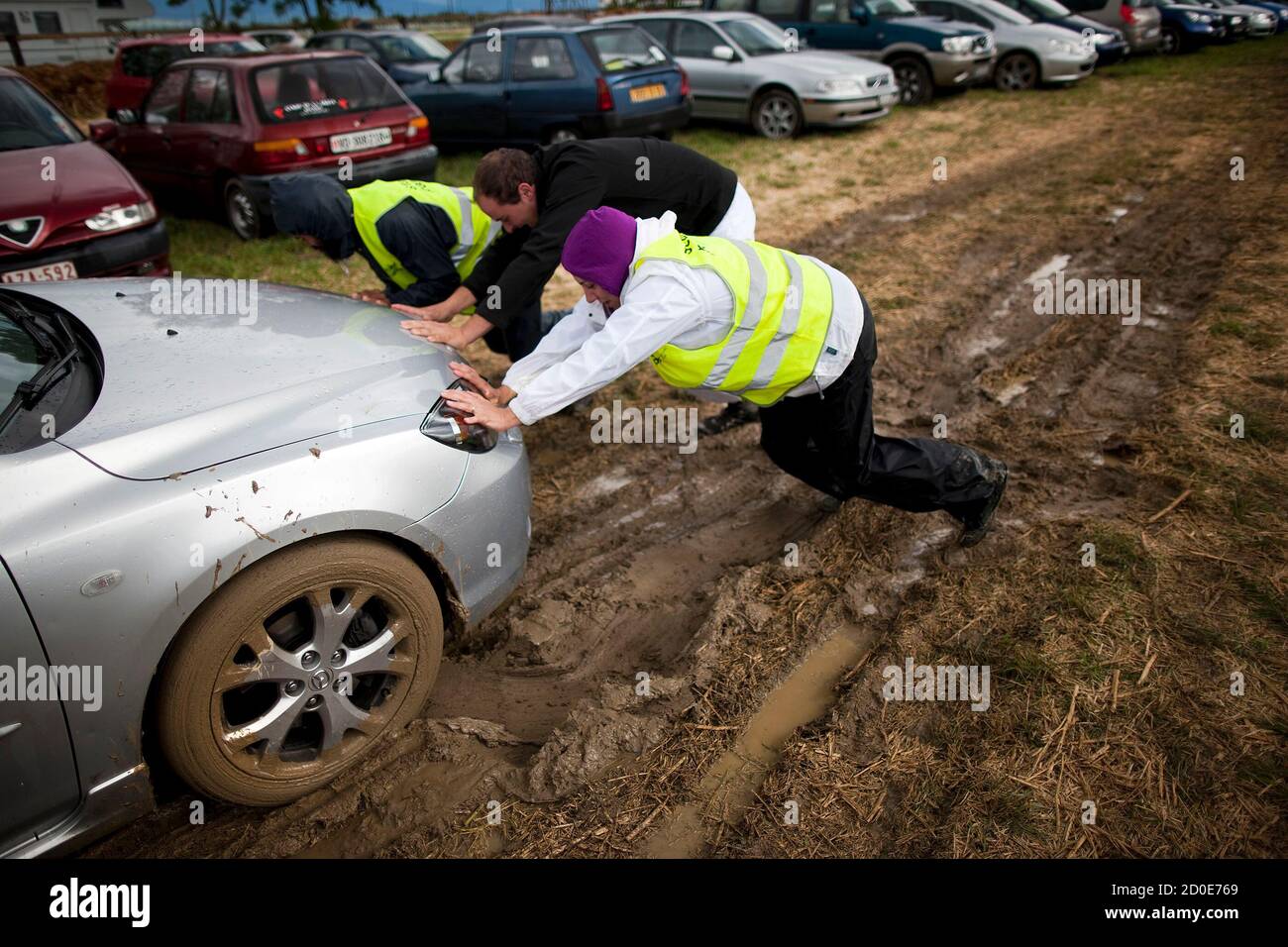 Push car stuck mud hi-res stock photography and images - Alamy