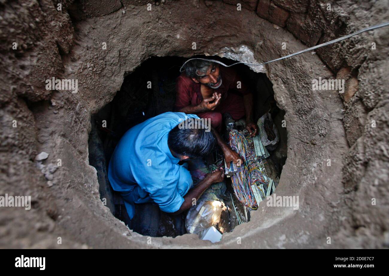 Wires into a hole hi-res stock photography and images - Alamy