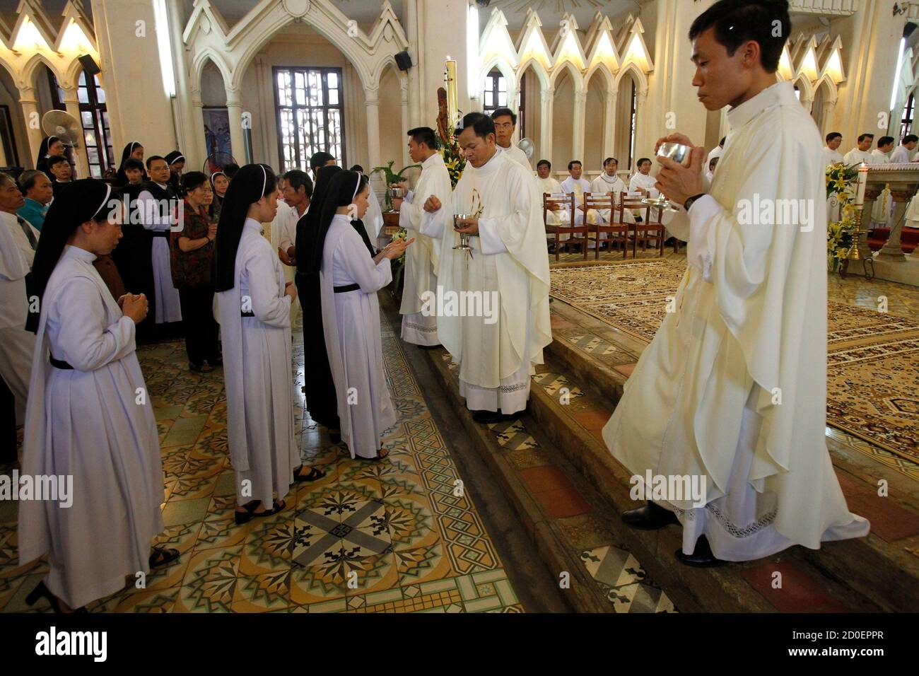 Newly ordained catholic priest hi-res stock photography and images - Alamy