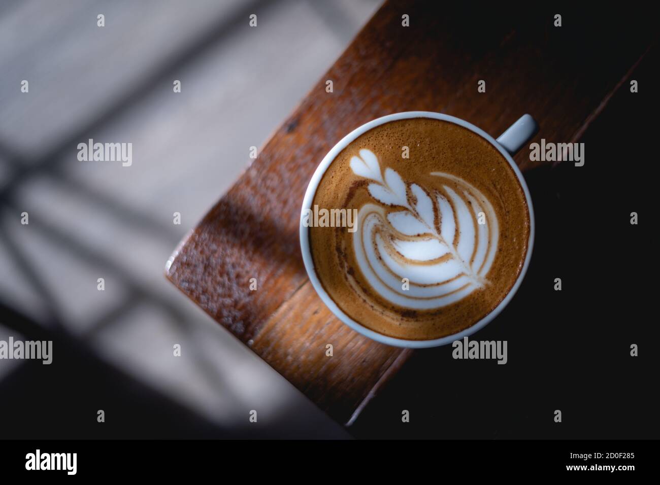 coffee on the wooden table from above. Urban coffee shop workspace or ...