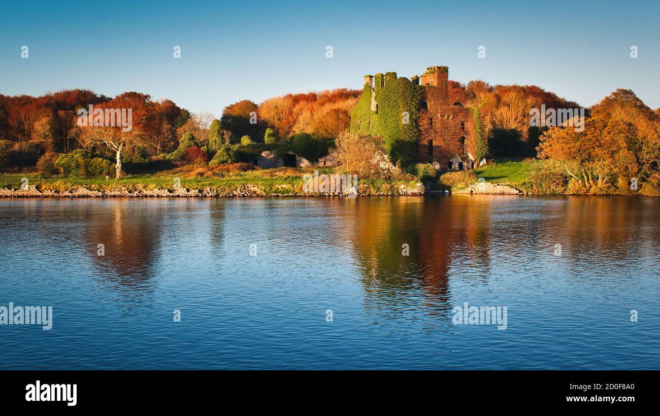 Beautiful autumn colored scenery of Menlo castle surrounded with fall ...