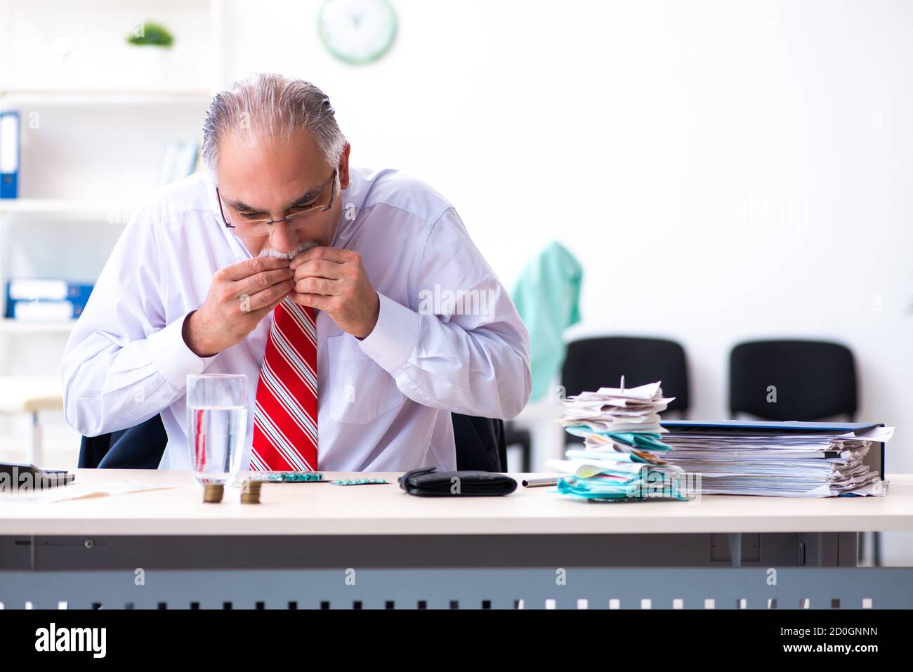 Old accountant in budget planning concept Stock Photo - Alamy