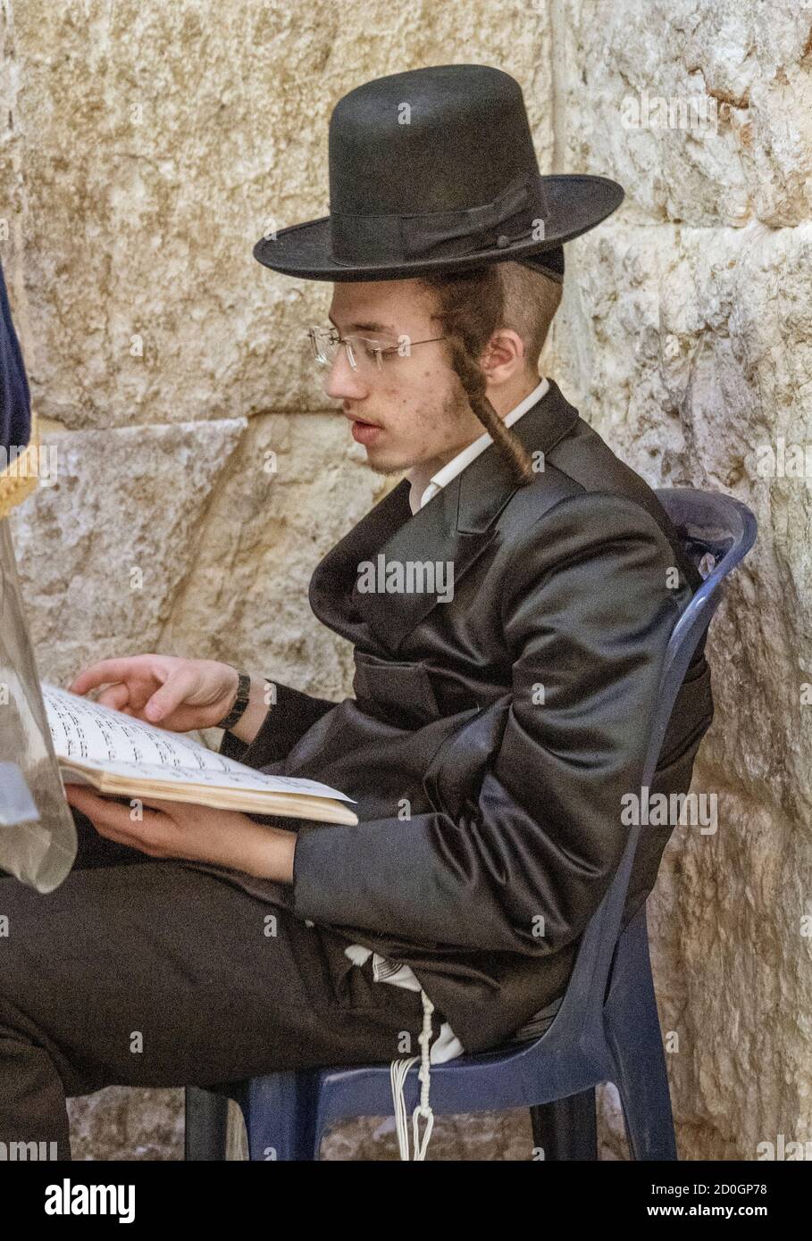 Jerusalem, Israel - 2019-04-26 - Young orthodox Jew studies holy book ...
