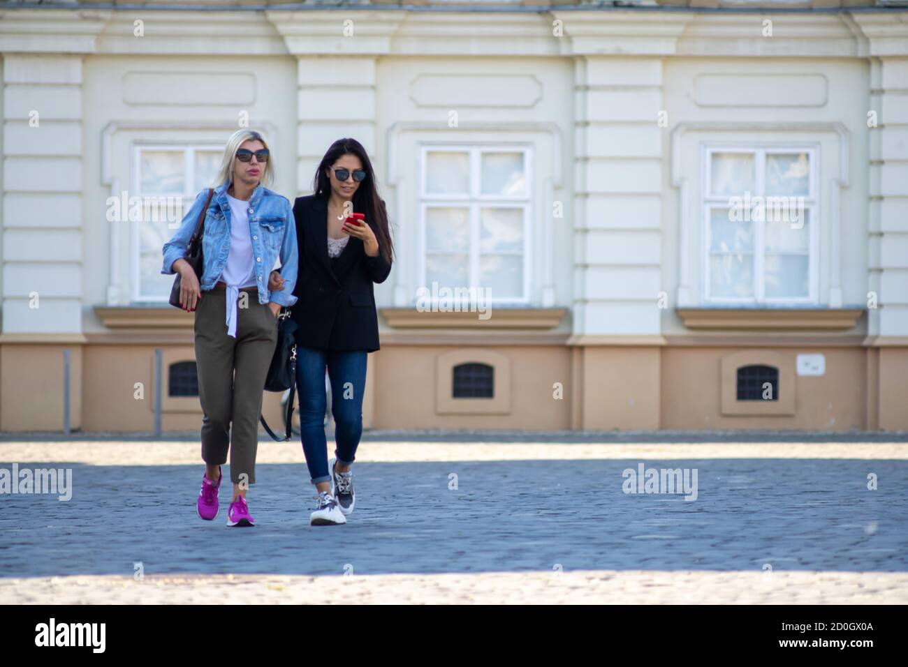 Timisoara, Romania - September 05, 2020: Two woman walking on the ...