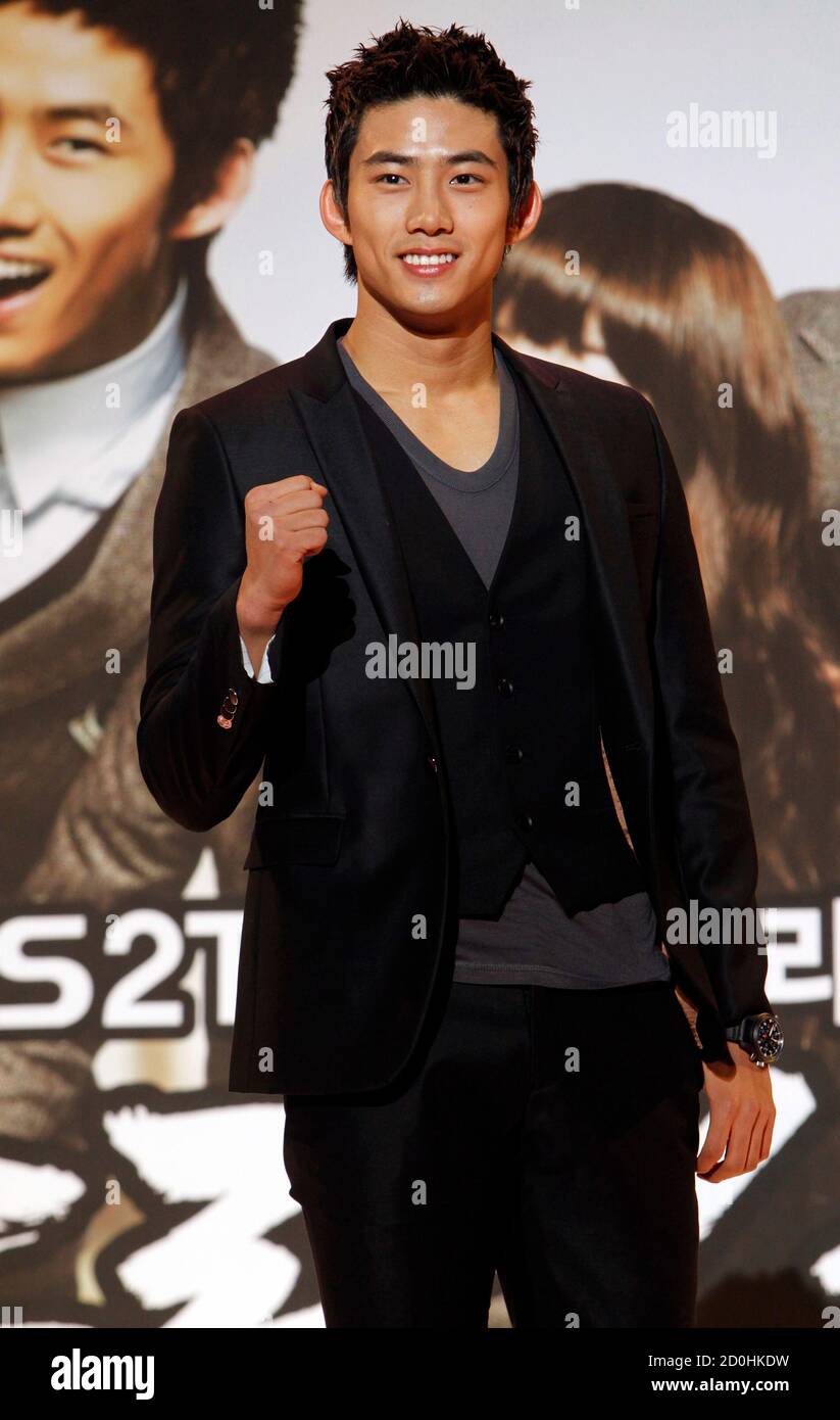 Cast member Oak Taec-yeon poses for photographs during a news ...