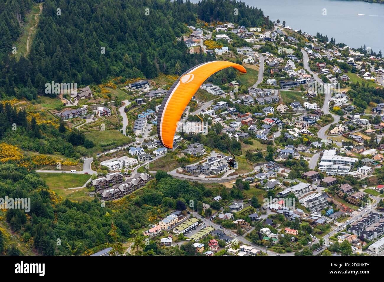 Queenstown, New Zealand: Paragliding tandems on their way from the ...