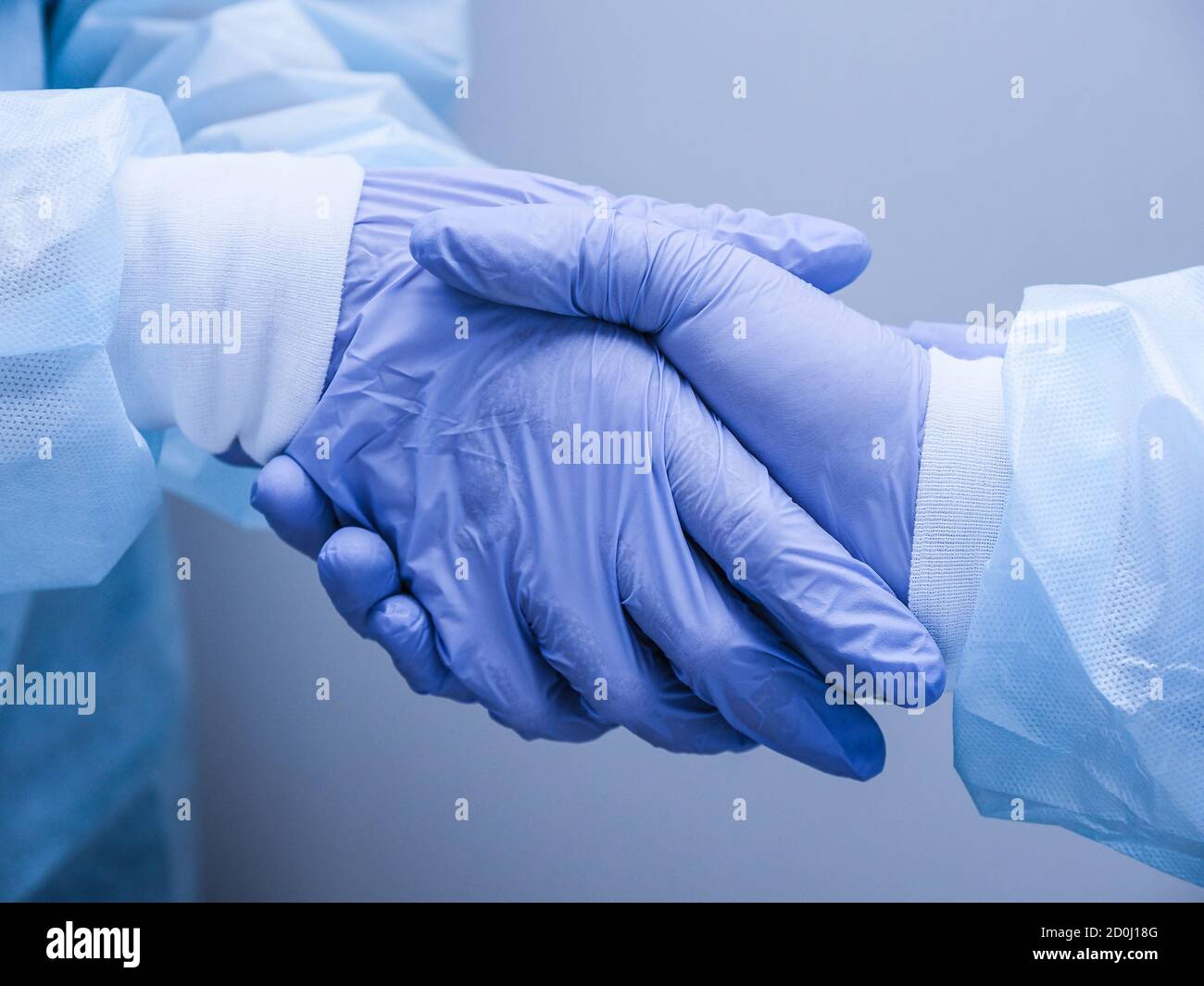 Closeup handshake doctors collaboration hi-res stock photography and ...