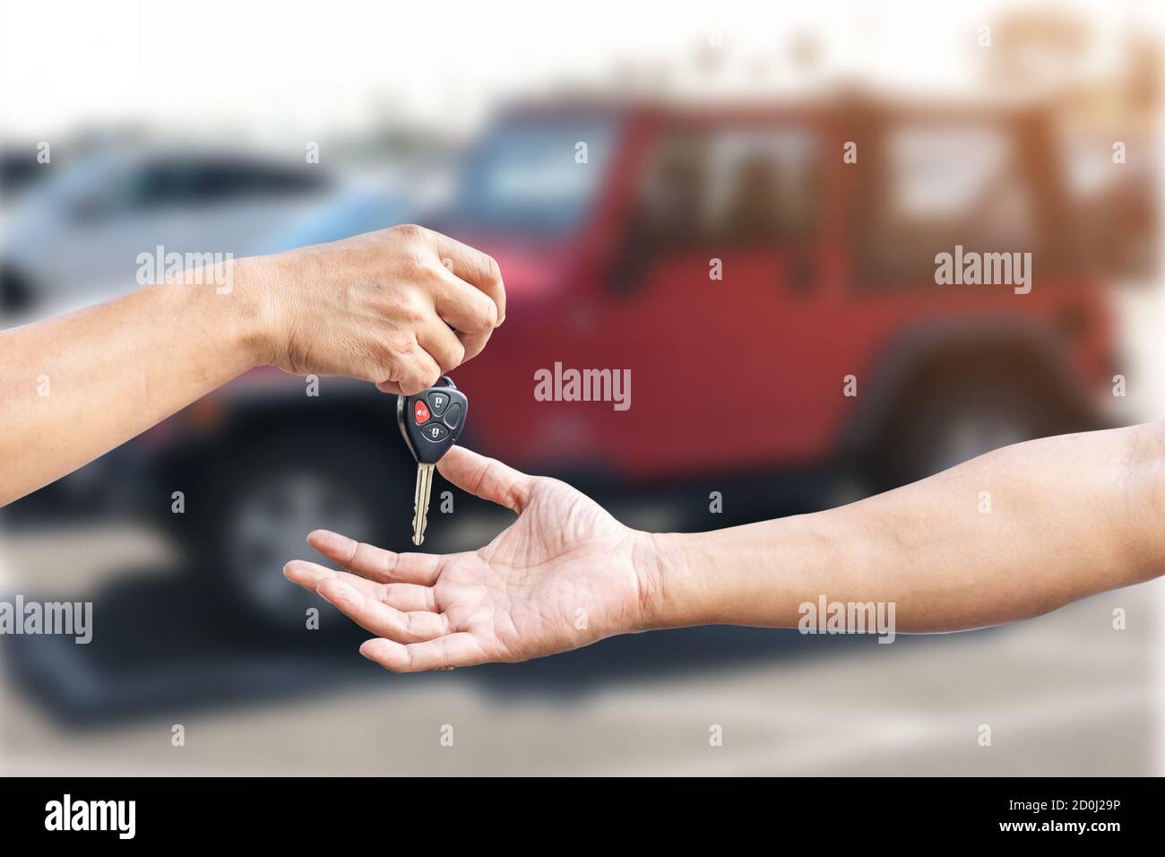 Hand giving key another hand hi-res stock photography and images - Alamy