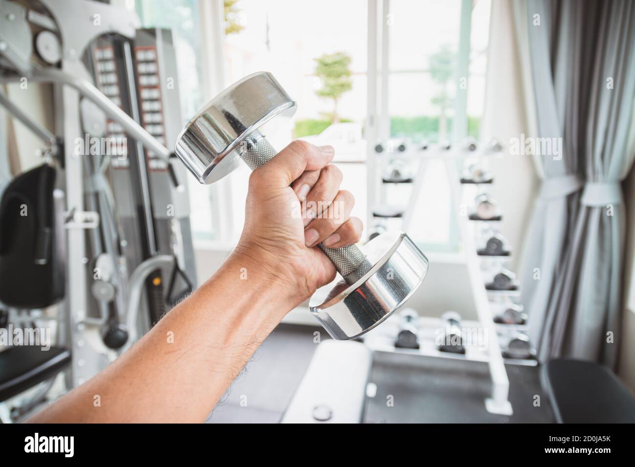 Lifting left arm hi-res stock photography and images - Alamy