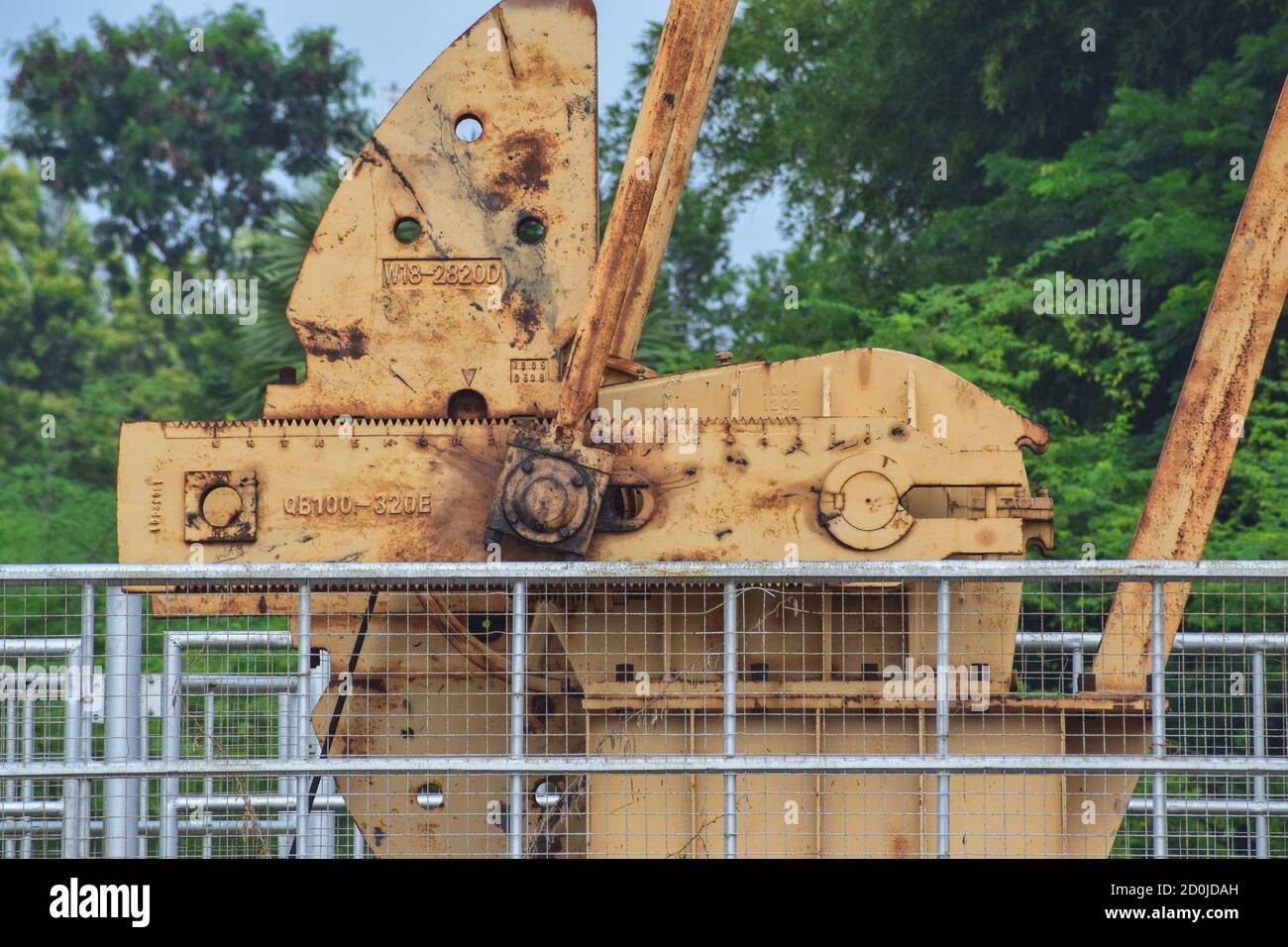 Old rusty oil pump jack machinery with rough surface and texture in ...