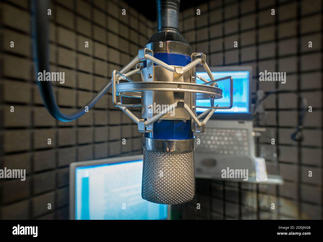 Podcast microphone and laptop computer in recording studio Stock Photo ...