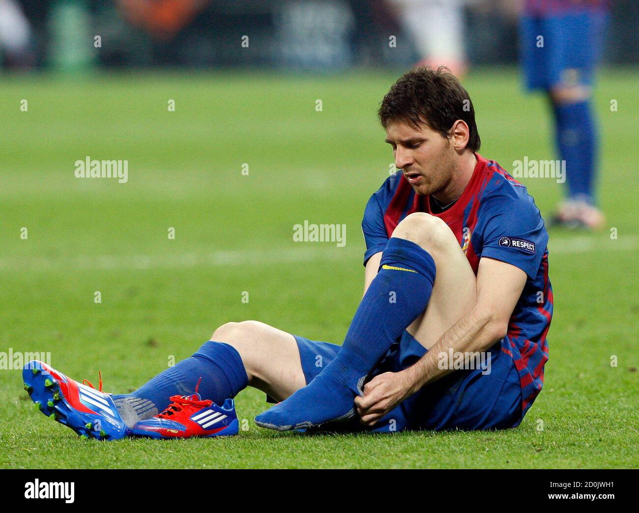 Adjusts his sock hi-res stock photography and images - Alamy