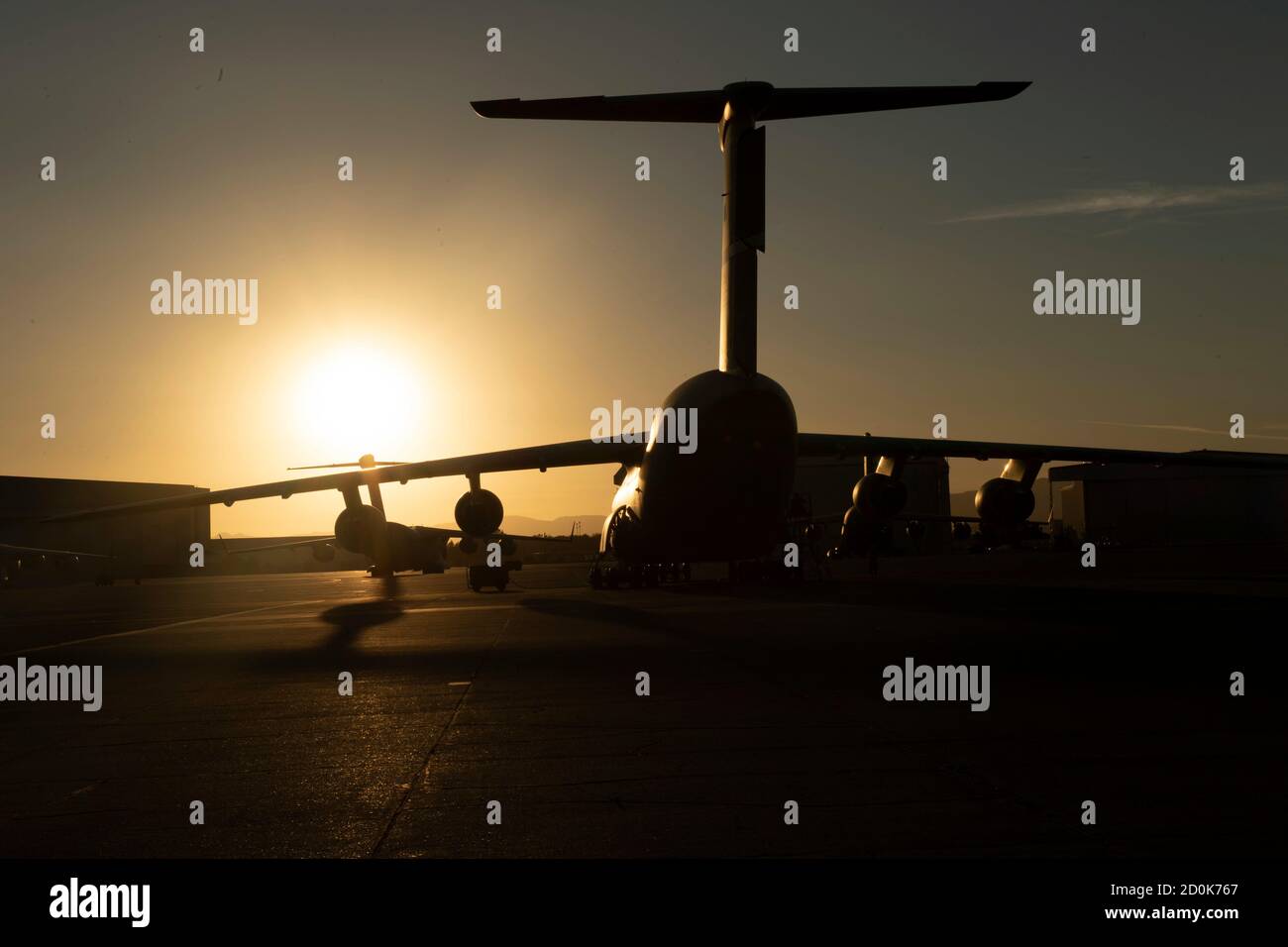 A C-5M Super Galaxy sits on the flight line at Travis Air Force Base ...