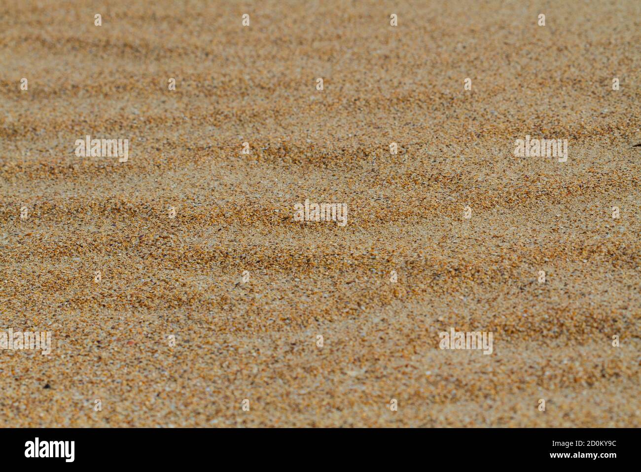 Sandy beach background Stock Photo - Alamy
