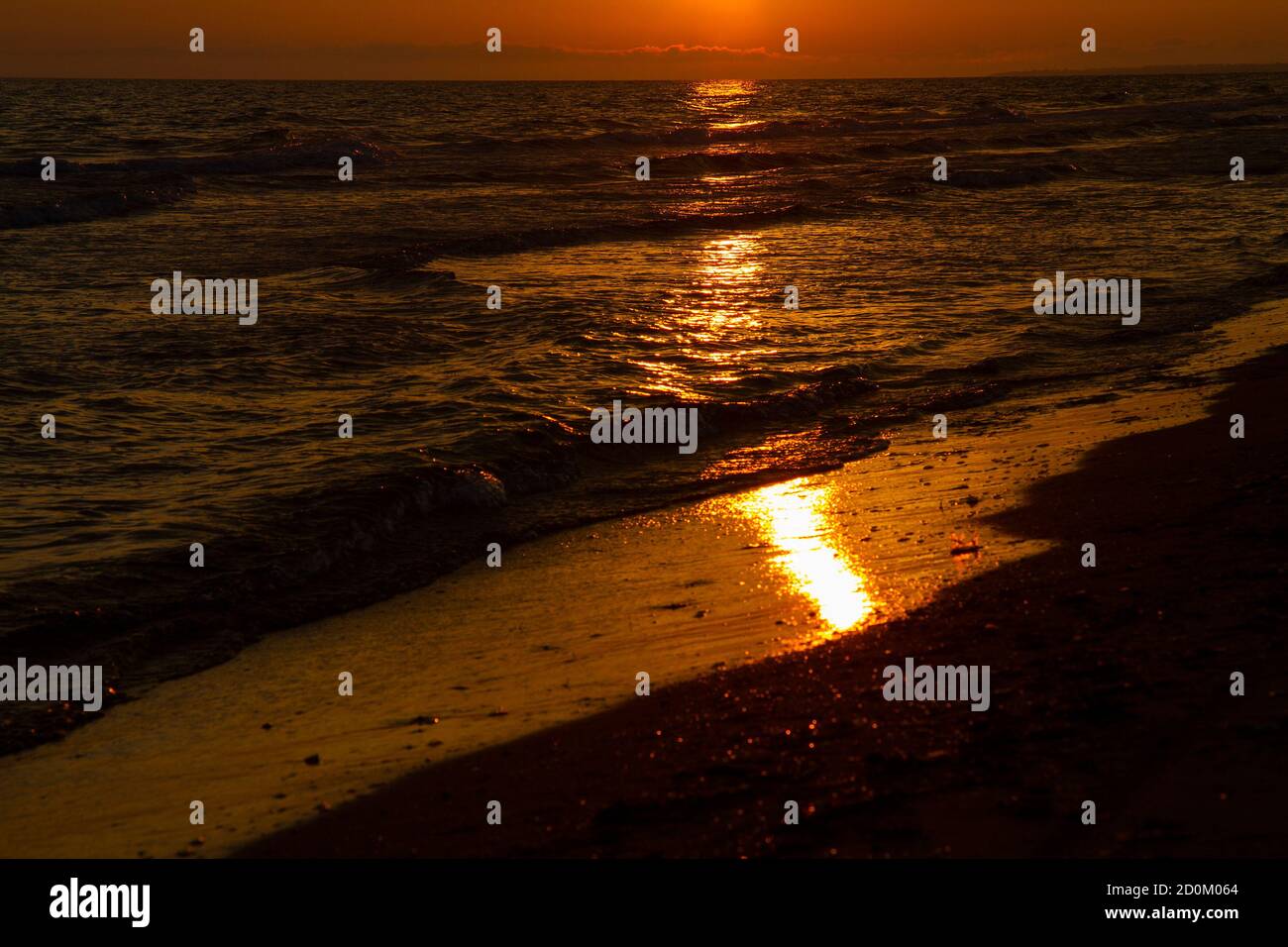Sunset over sea Stock Photo - Alamy