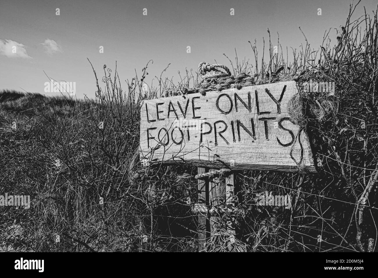 Beach Sign Leave no Footprints on beach on Gower Peninsular Rhossilli ...