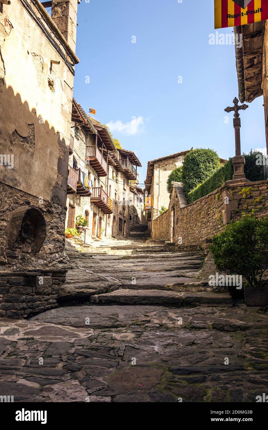 RUPIT I PRUIT, SPAIN - OCTOBER 04, 2016: Volcanic natural stone street ...