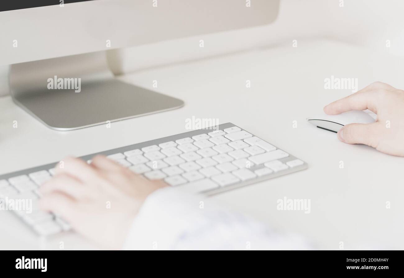 Hands using computer keyboard mouse hi-res stock photography and images ...