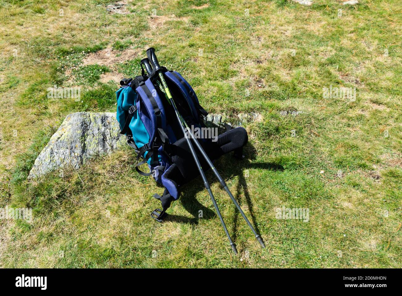 Trekking equipment, large backpack and telescopic poles Stock Photo - Alamy