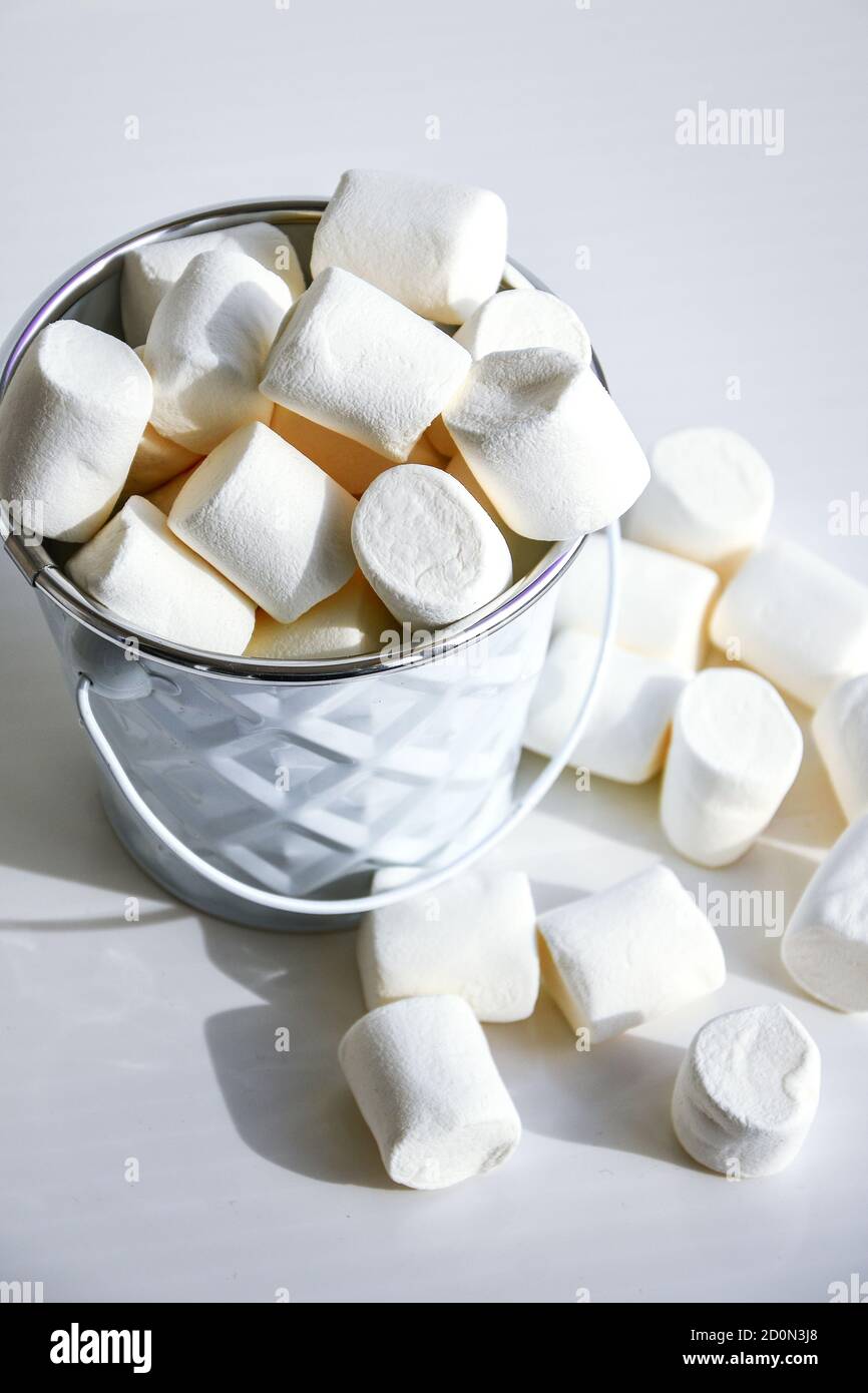 White mini marshmallows background close-up texture. Food background ...