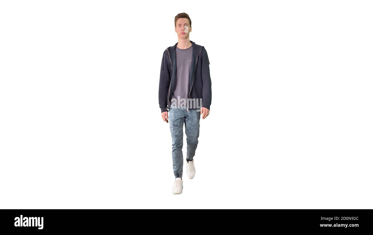 Young attractive student walking forward on white background Stock ...