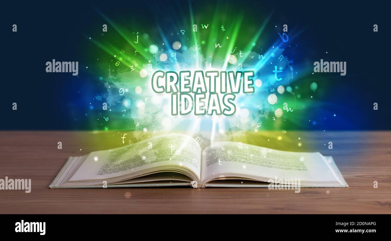 CREATIVE IDEAS inscription coming out from an open book, educational ...