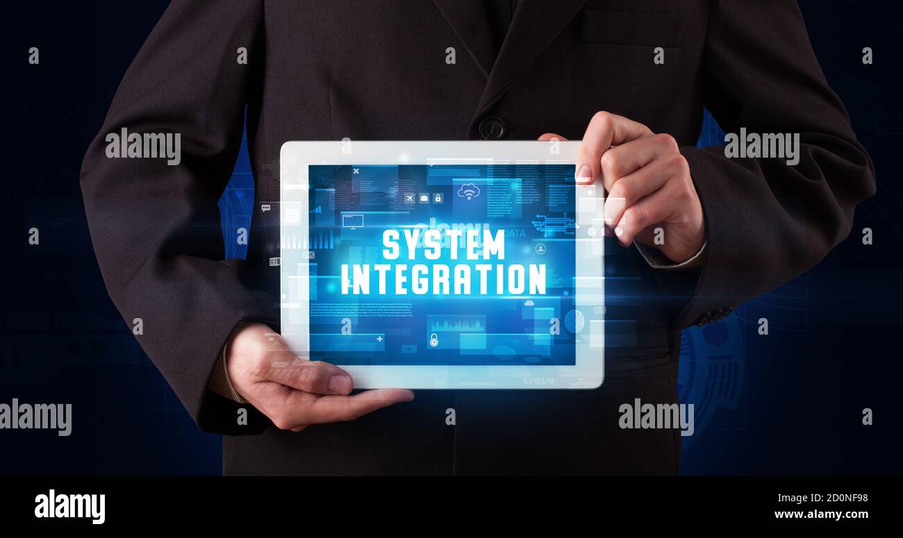 Young business person working on tablet and shows the digital sign ...