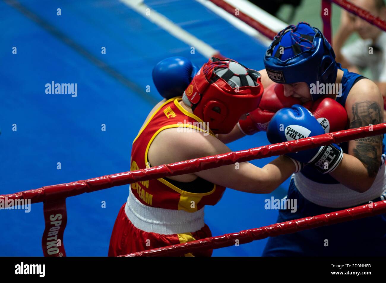 KHARKIV, UKRAINE - OCTOBER 1, 2020: Girls boxers in the fight on the ...