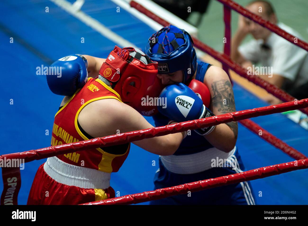KHARKIV, UKRAINE - OCTOBER 1, 2020: Girls boxers in the fight on the ...