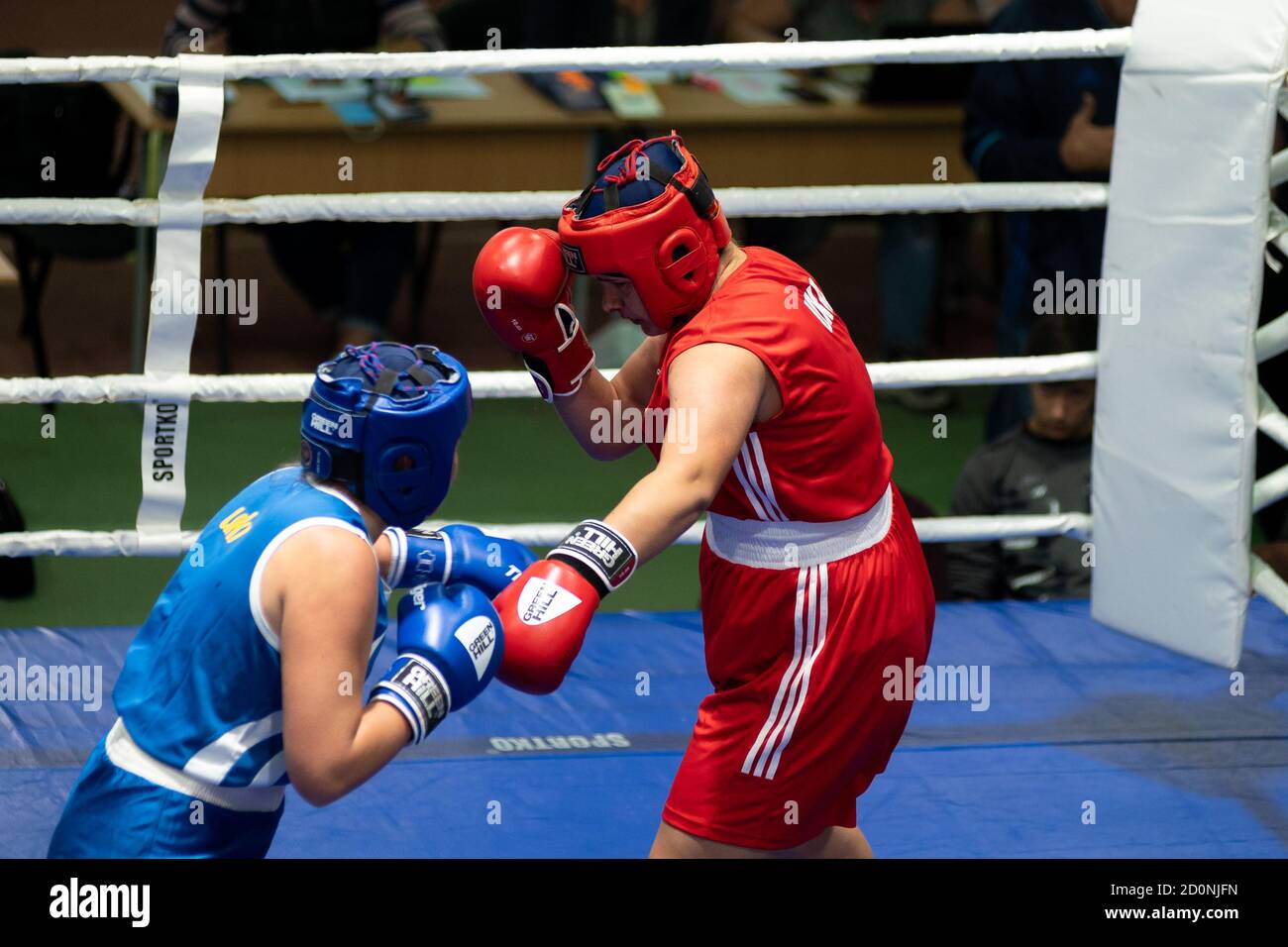 KHARKIV, UKRAINE - OCTOBER 1, 2020: Girls boxers in the fight on the ...