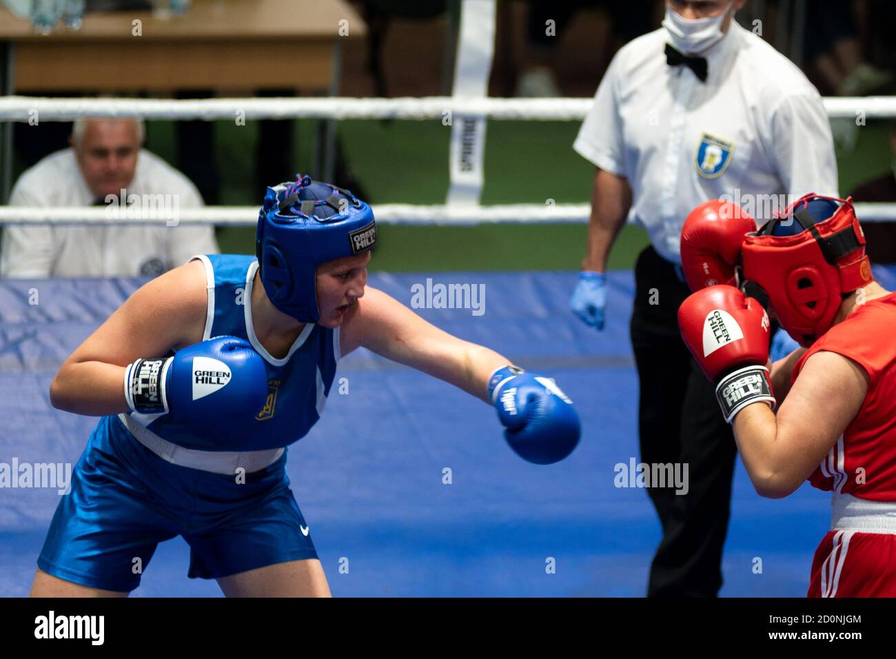 KHARKIV, UKRAINE - OCTOBER 1, 2020: Girls boxers in the fight on the ...