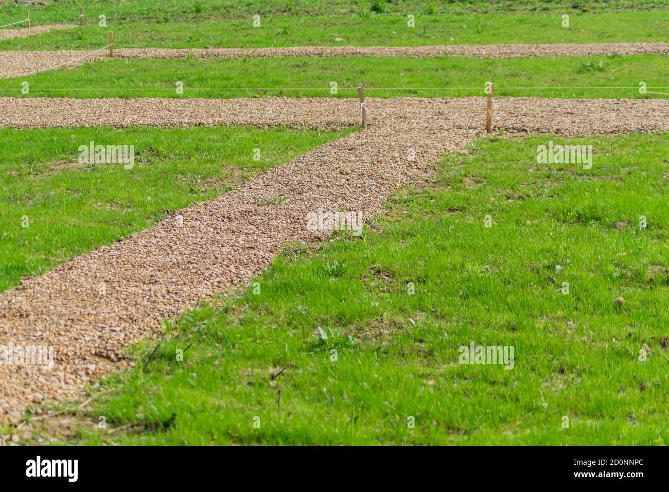 marking garden paths on the construction site. Countryside house ...
