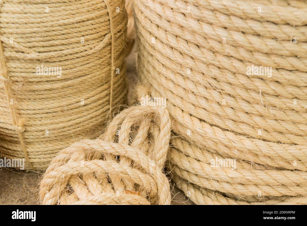Close up view of twisted rope made of sisal. Background Stock Photo - Alamy