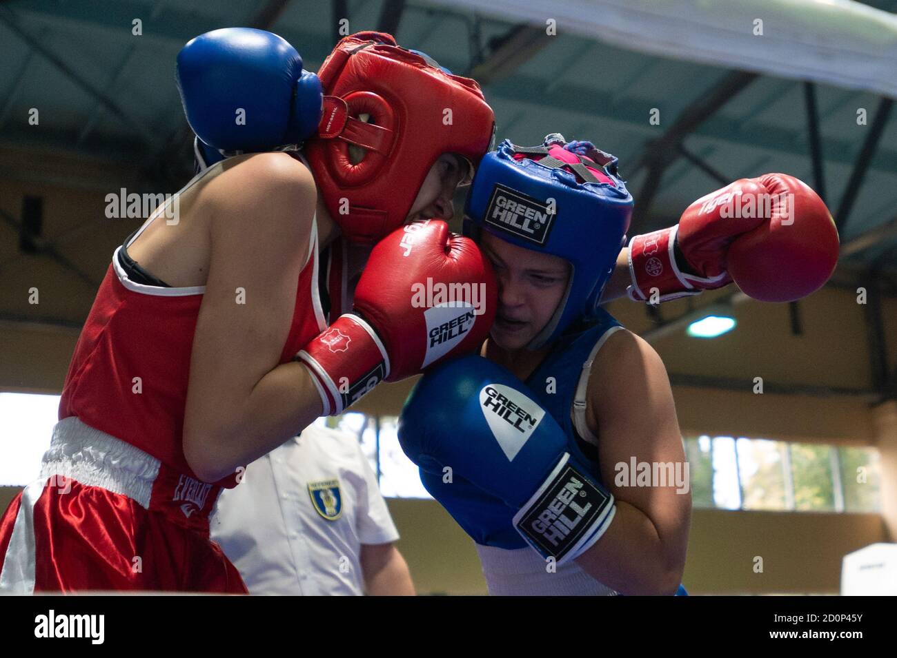 KHARKIV, UKRAINE - OCTOBER 2, 2020: Girls boxers in the fight on the ...
