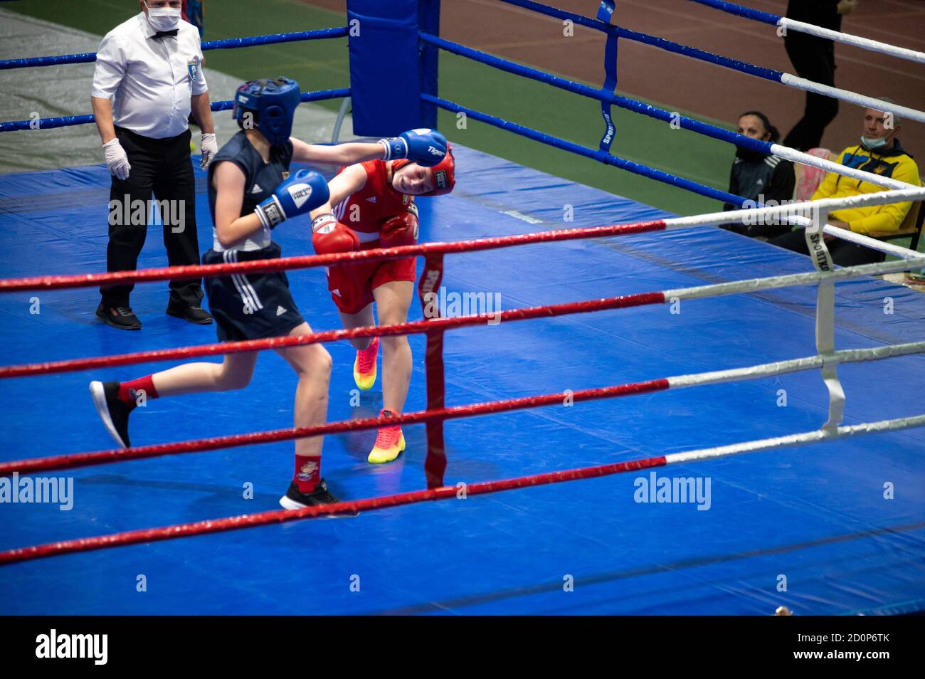 KHARKIV, UKRAINE - OCTOBER 2, 2020: Girls boxers in the fight on the ...