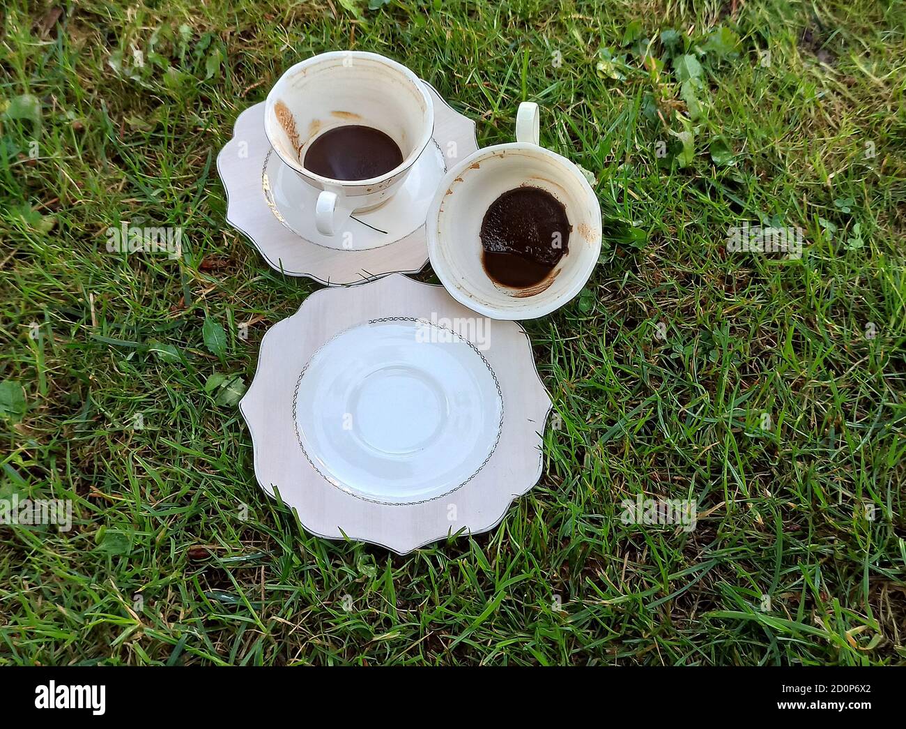 The cup of coffee on a morning grass image Stock Photo - Alamy