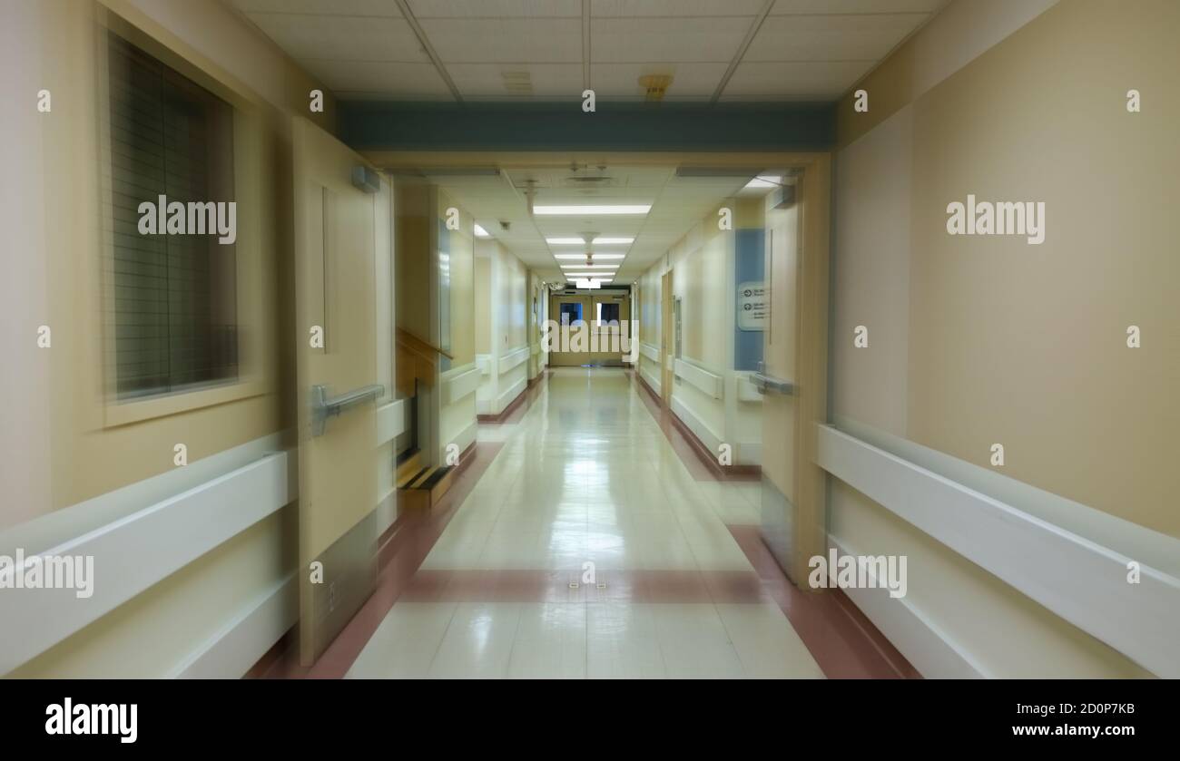 Empty hospital or health care facility corridor Stock Photo - Alamy