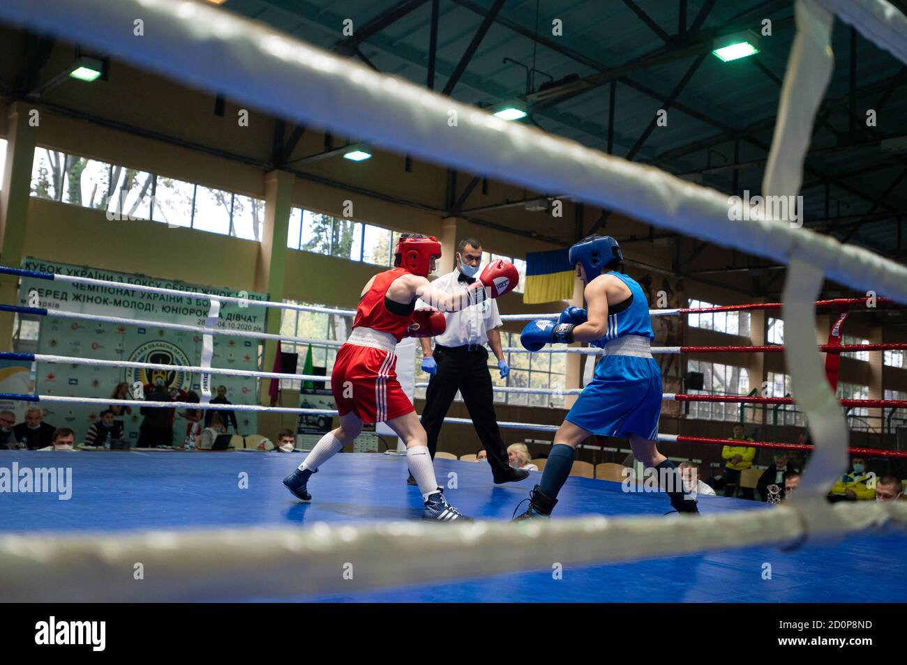 KHARKIV, UKRAINE - OCTOBER 2, 2020: Girls boxers in the fight on the ...