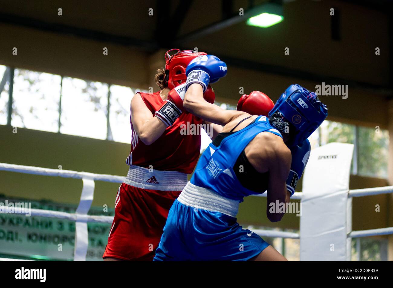 KHARKIV, UKRAINE - OCTOBER 2, 2020: Girls boxers in the fight on the ...