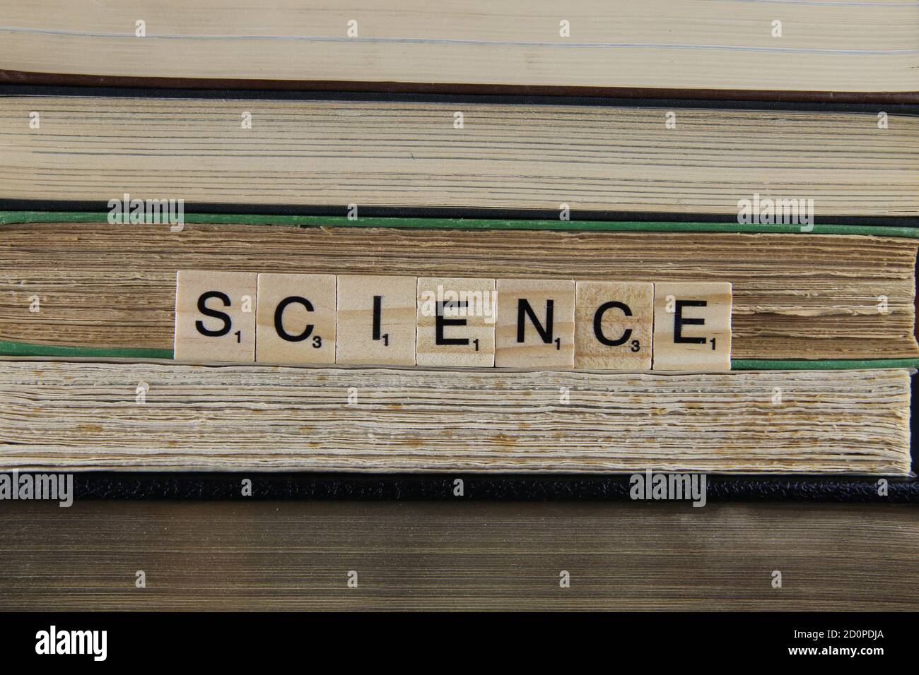 View on stacked old books with word science (focus on center Stock ...