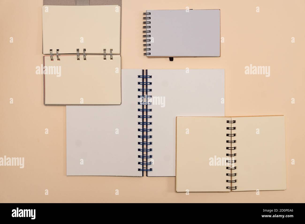 plenty of open notebooks made from recycled paper. Stationery mock up ...