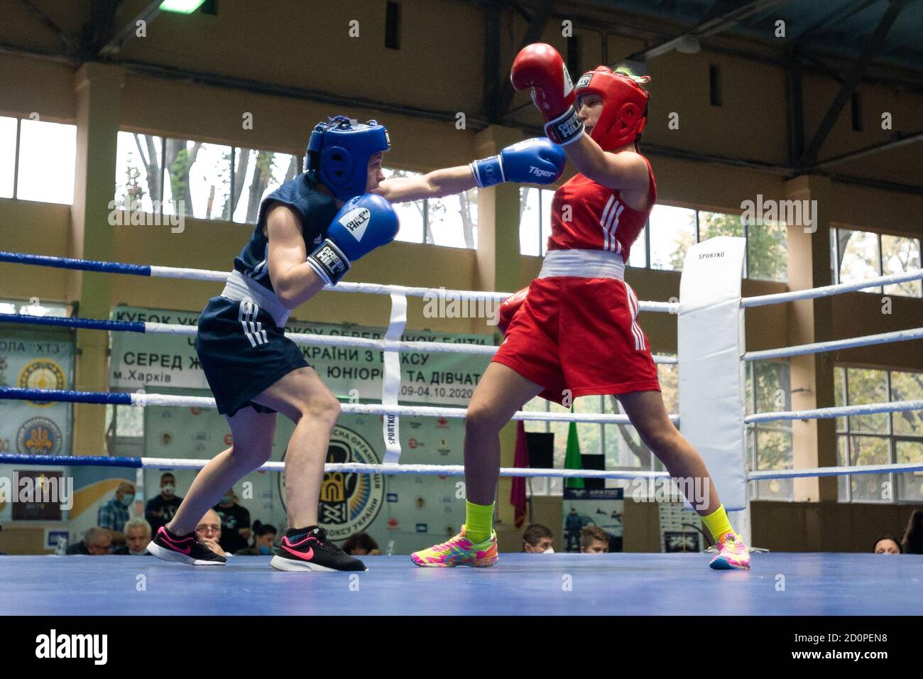 KHARKIV, UKRAINE - OCTOBER 2, 2020: Girls boxers in the fight on the ...