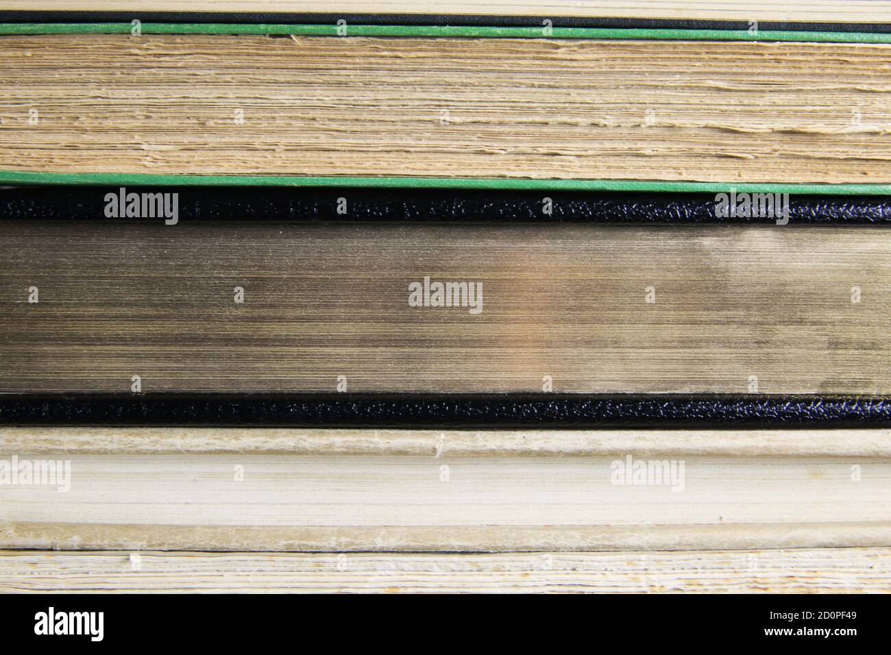 View on fore edge of isolated stacked old yellowed books with copy ...