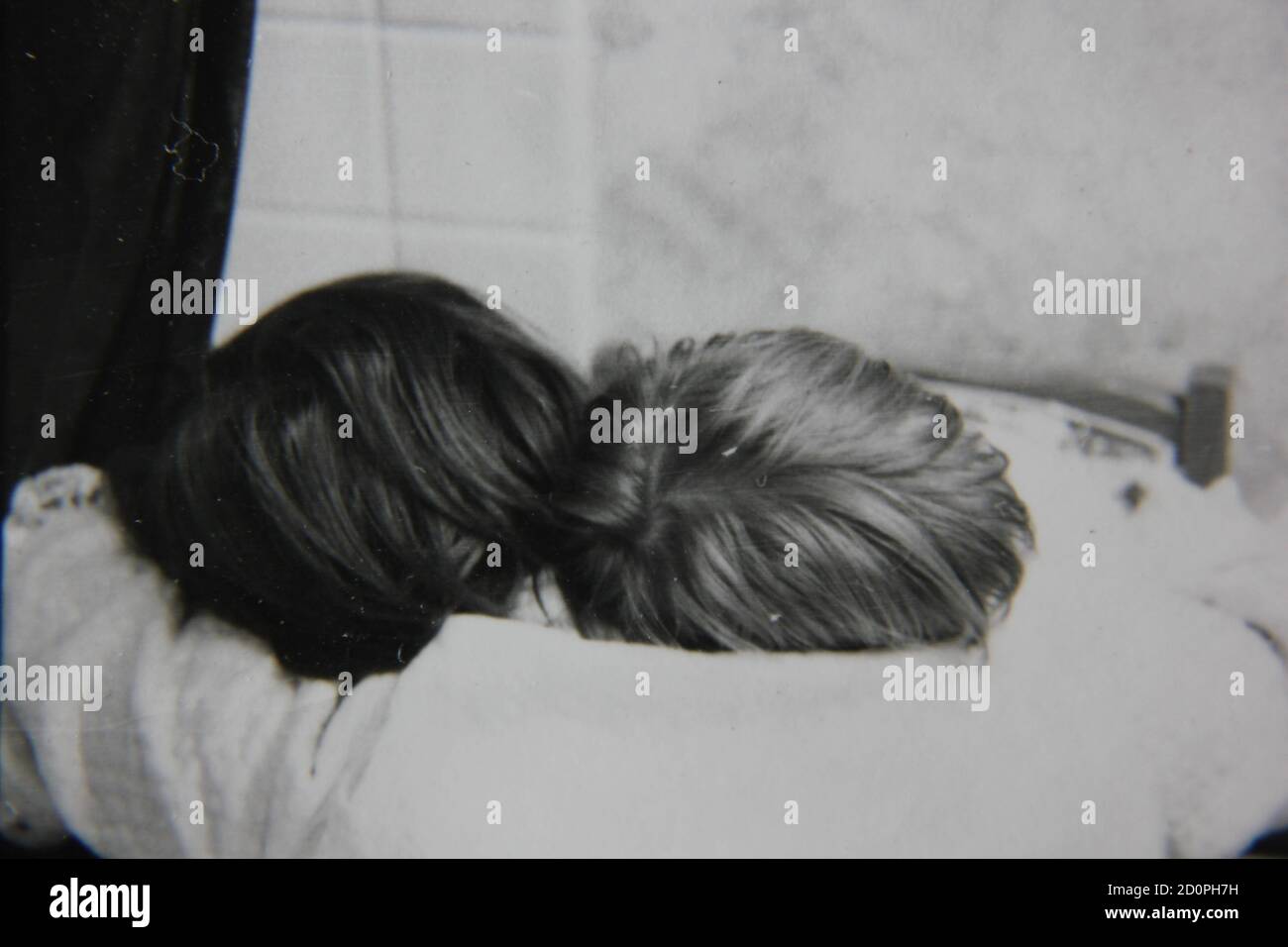 Fine 1970s vintage black and white photography of a mother parenting ...